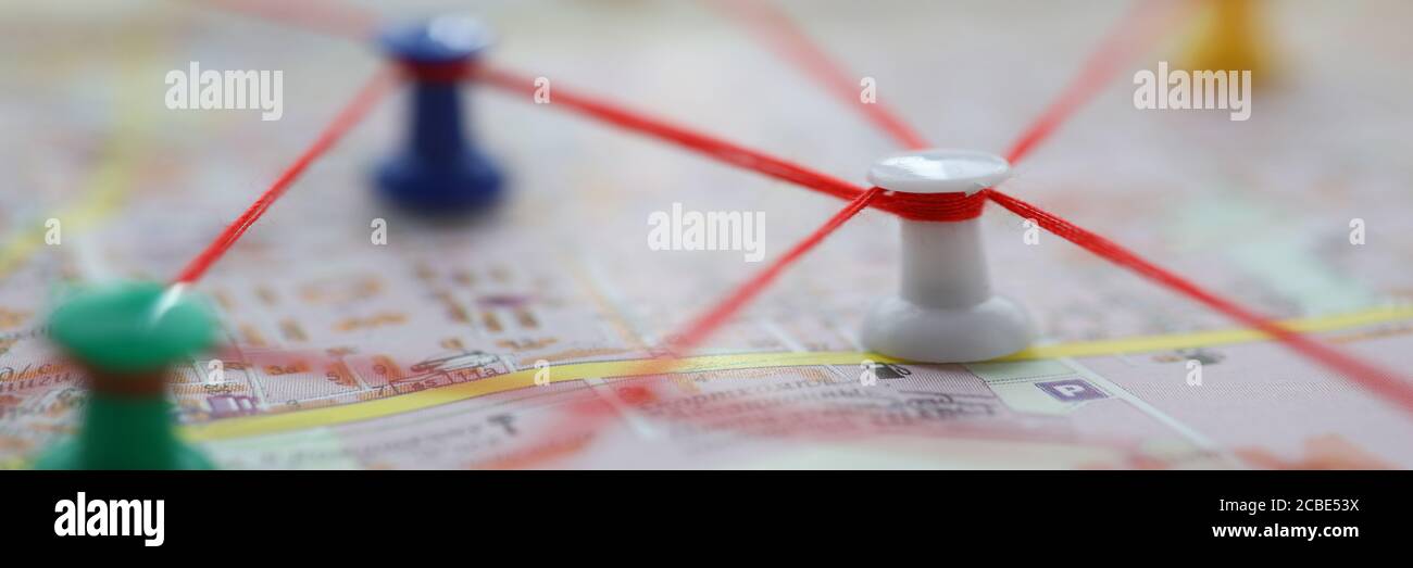 Multi-colored buttons pinned on a map of the area Stock Photo - Alamy