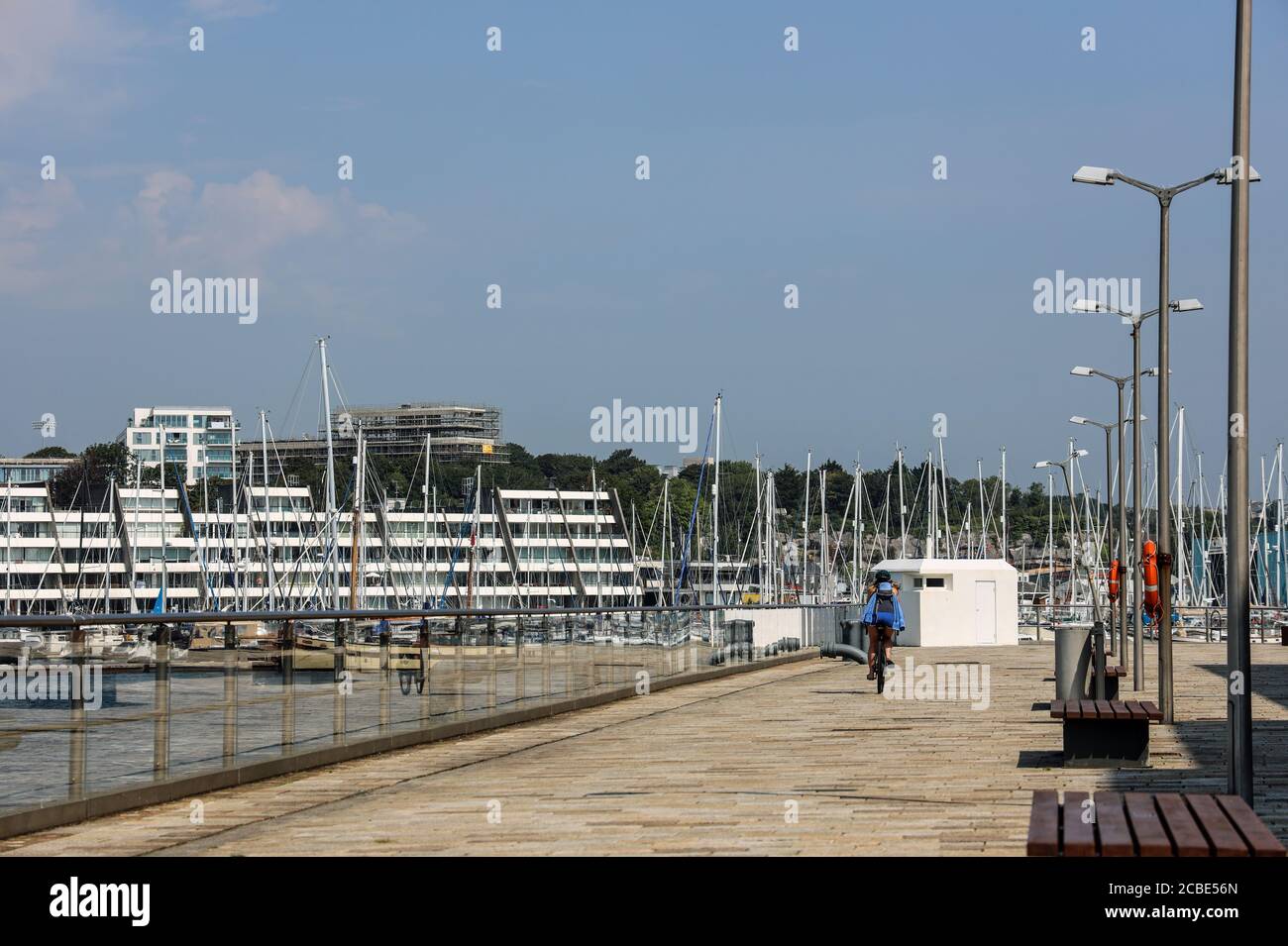 A cyclist enjoys a riverside route at Royal William Yard in Stonehouse ...