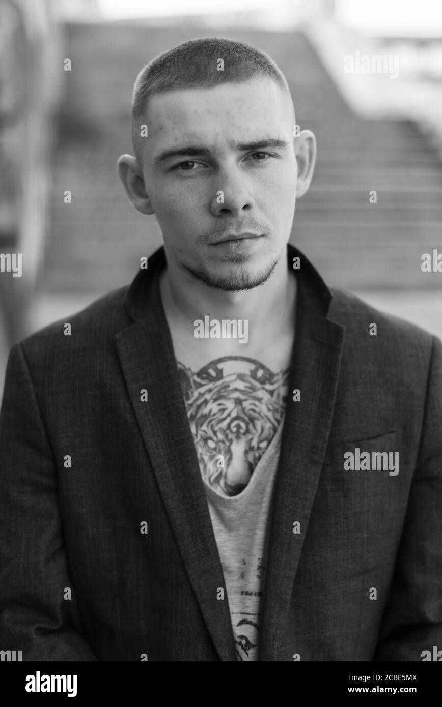 Portrait of a bully man in a jacket. Black and white photo Stock Photo ...