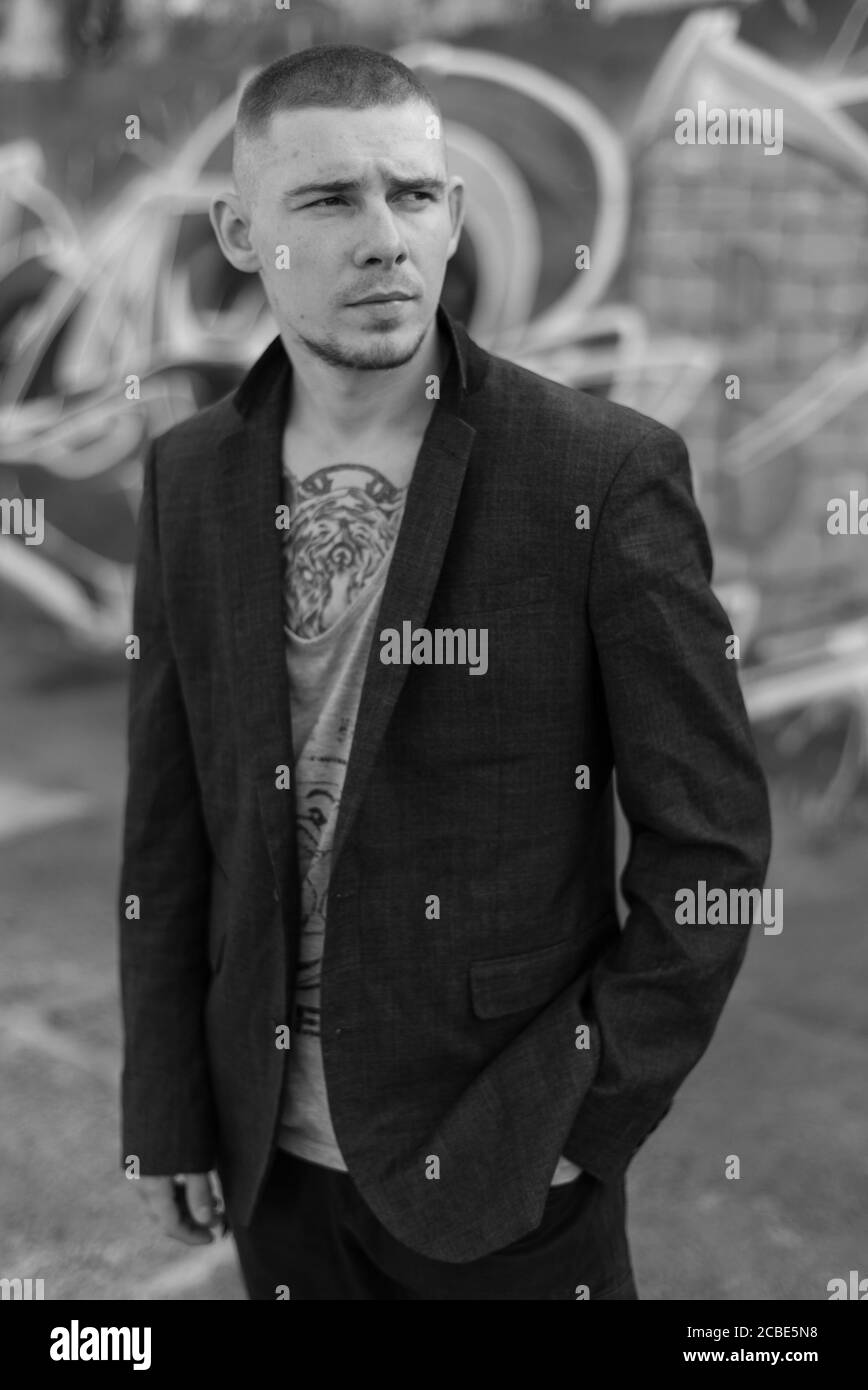 Portrait of a bully man in a jacket. Black and white photo Stock Photo ...