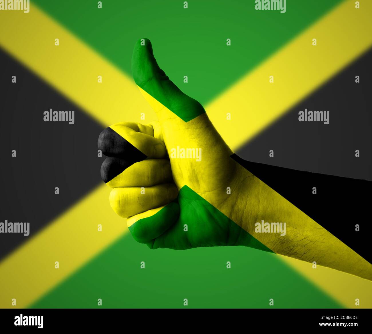 Hand with thumbs up for Jamaica Stock Photo - Alamy