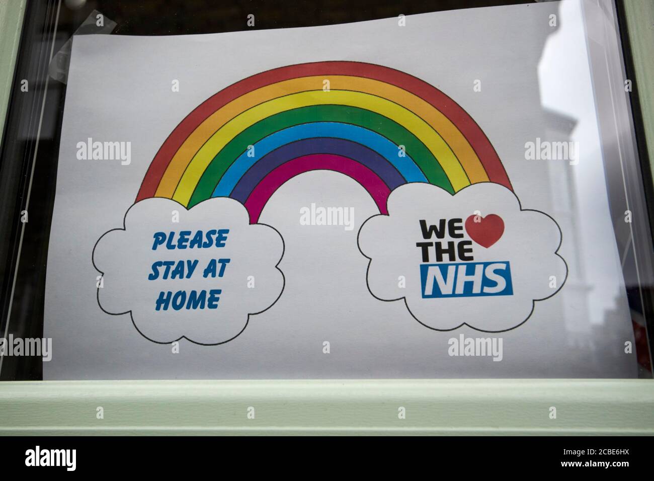 rainbow posters made by children for the nhs placed in windows during ...