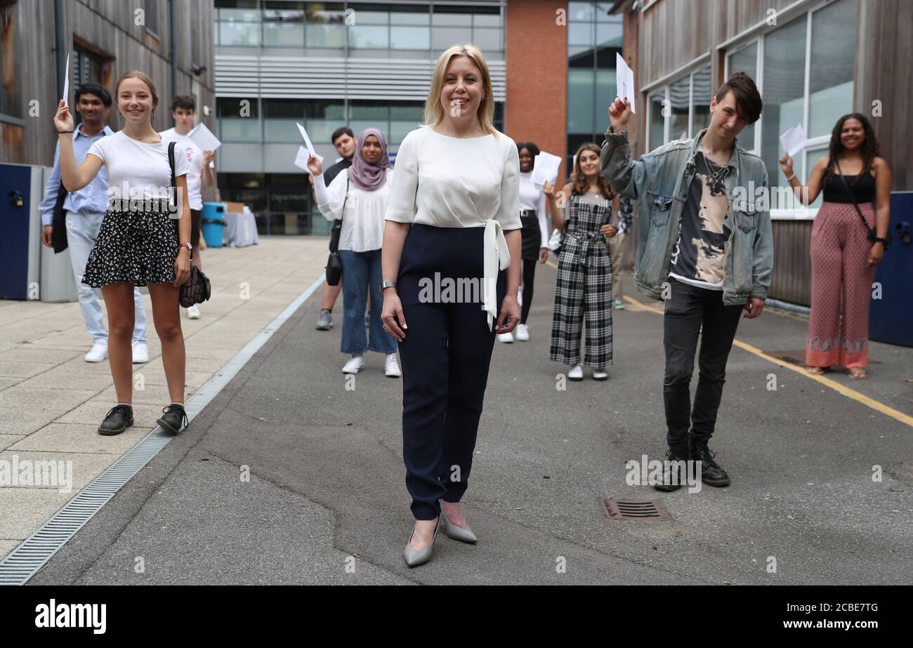 Principle Sara Russell (centre) poses for a photograph with students at ...