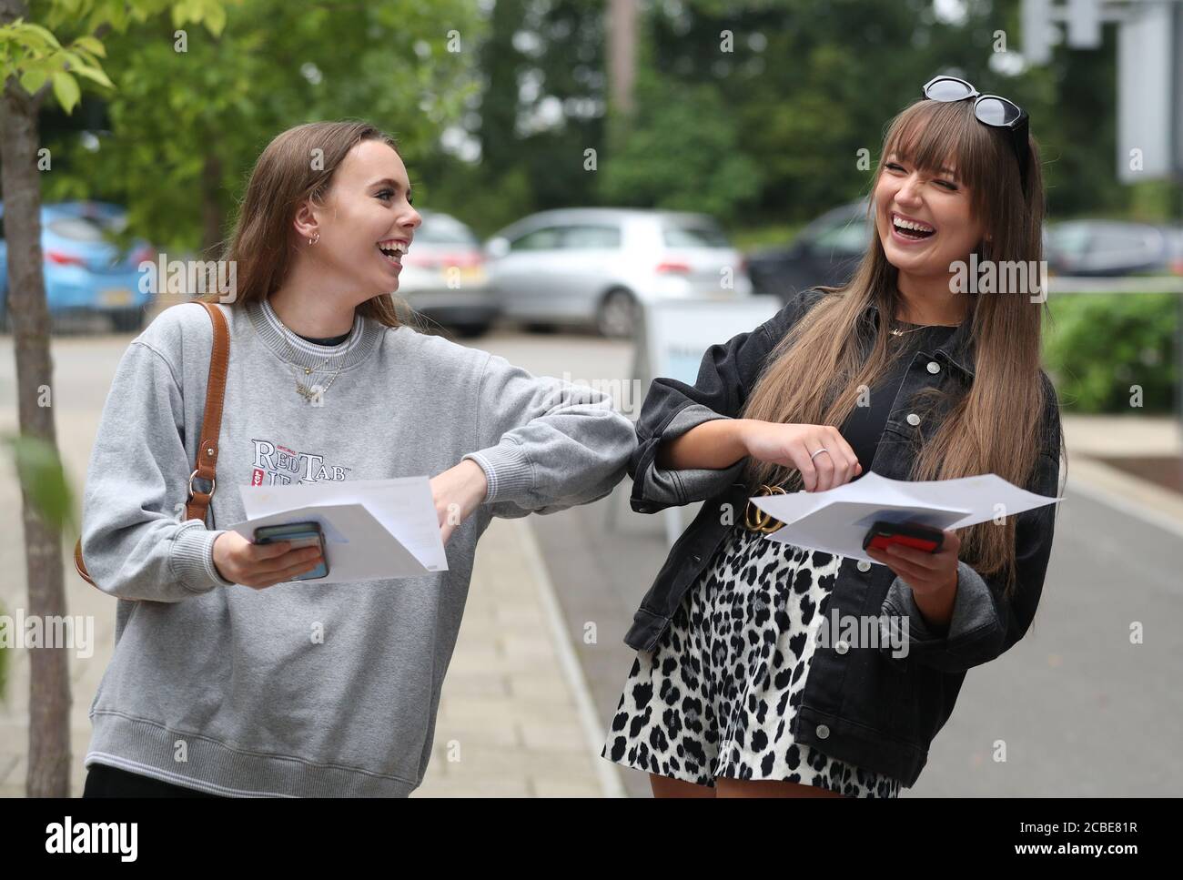 Friends Helen Lee (left) and Sophia-Ellis Shipp congratulate each other ...