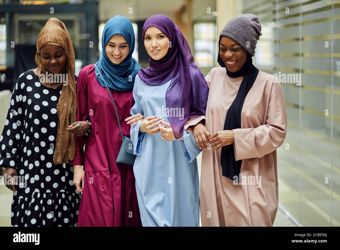 Diverse muslim multiethnic female representatives participating in ...