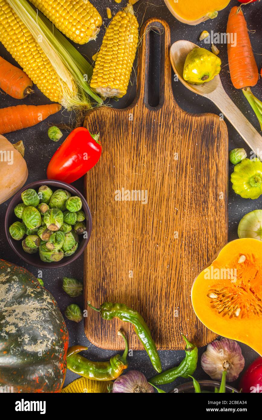 Autumn cooking background. Organic autumn harvest vegetables, raw vegan ...