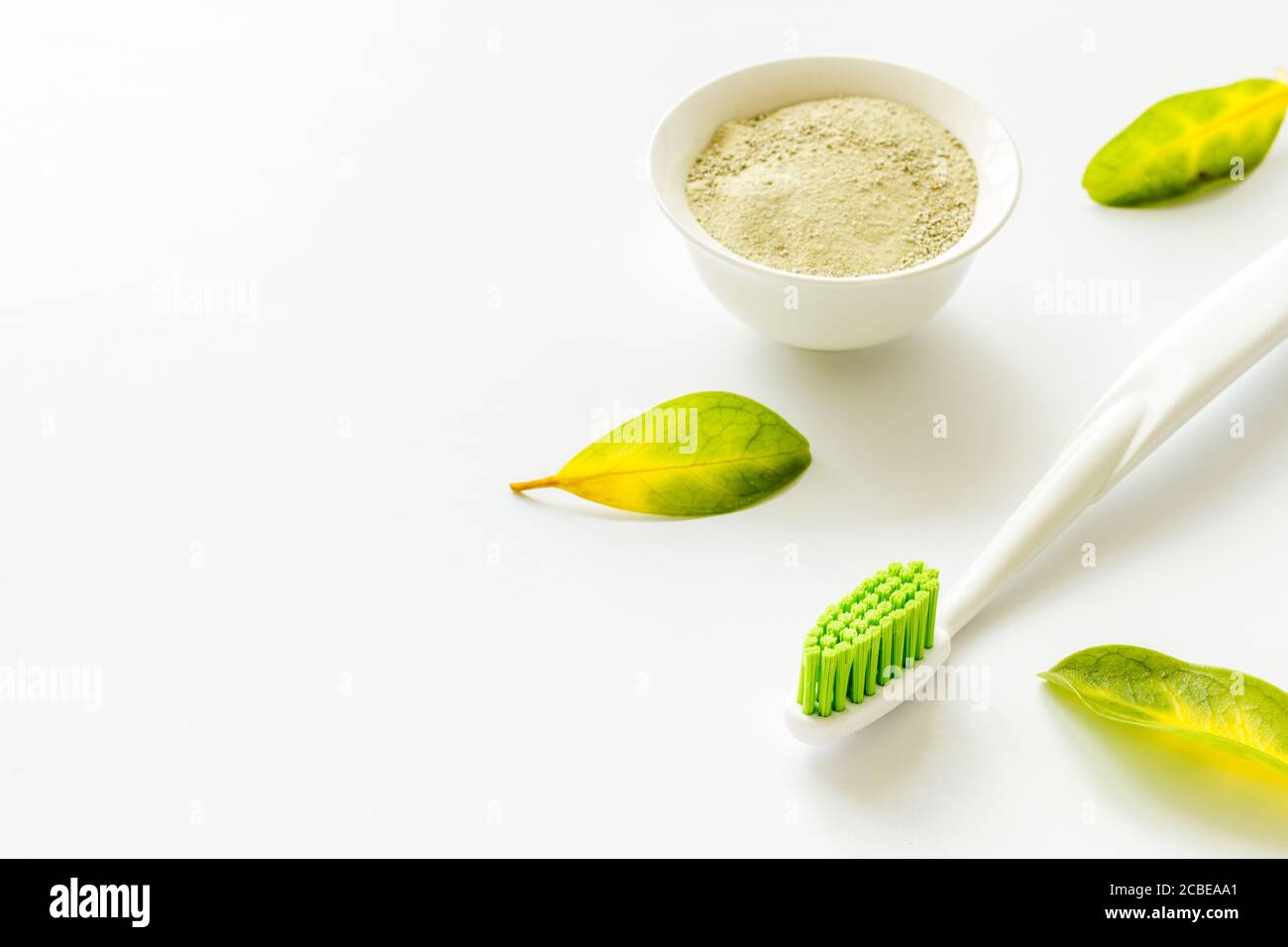 Herbal dental tooth powder with toothbrush. Health care and hygiene ...