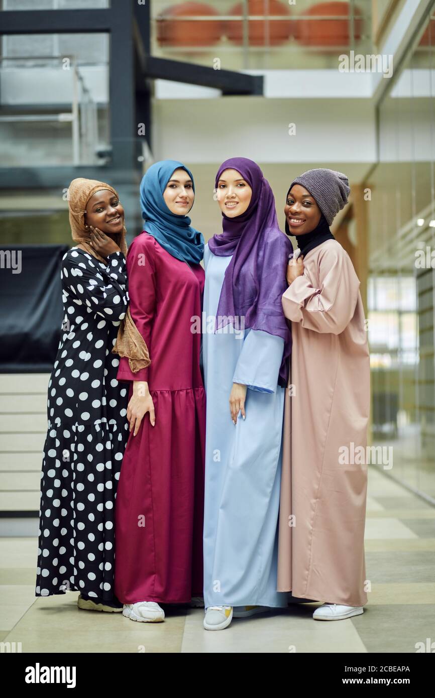 Diverse muslim multiethnic female representatives participating in ...