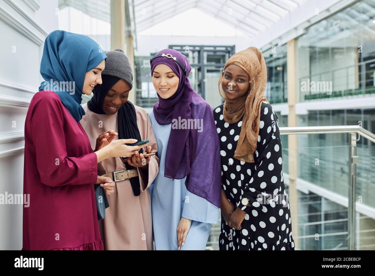 Group of islamic women of different ethnicity dressed in smart ...