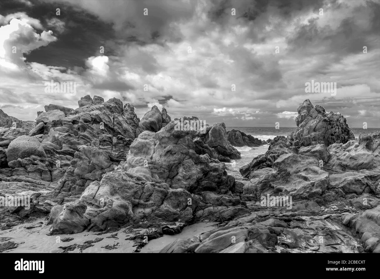 GRAPHIC COASTAL ROCKS Stock Photo - Alamy