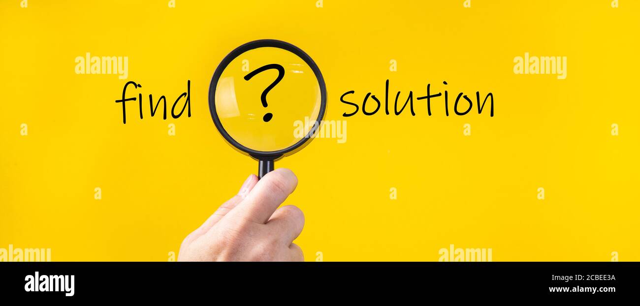 Magnifier with a question mark in focus - the concept of finding a ...
