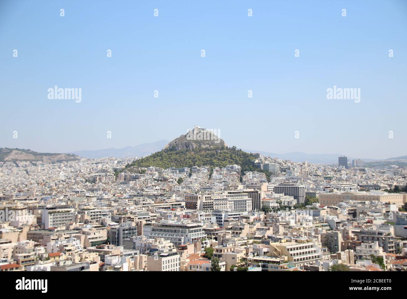 Aerial view of the Mount Lycabettus and city buildings around it in the ...