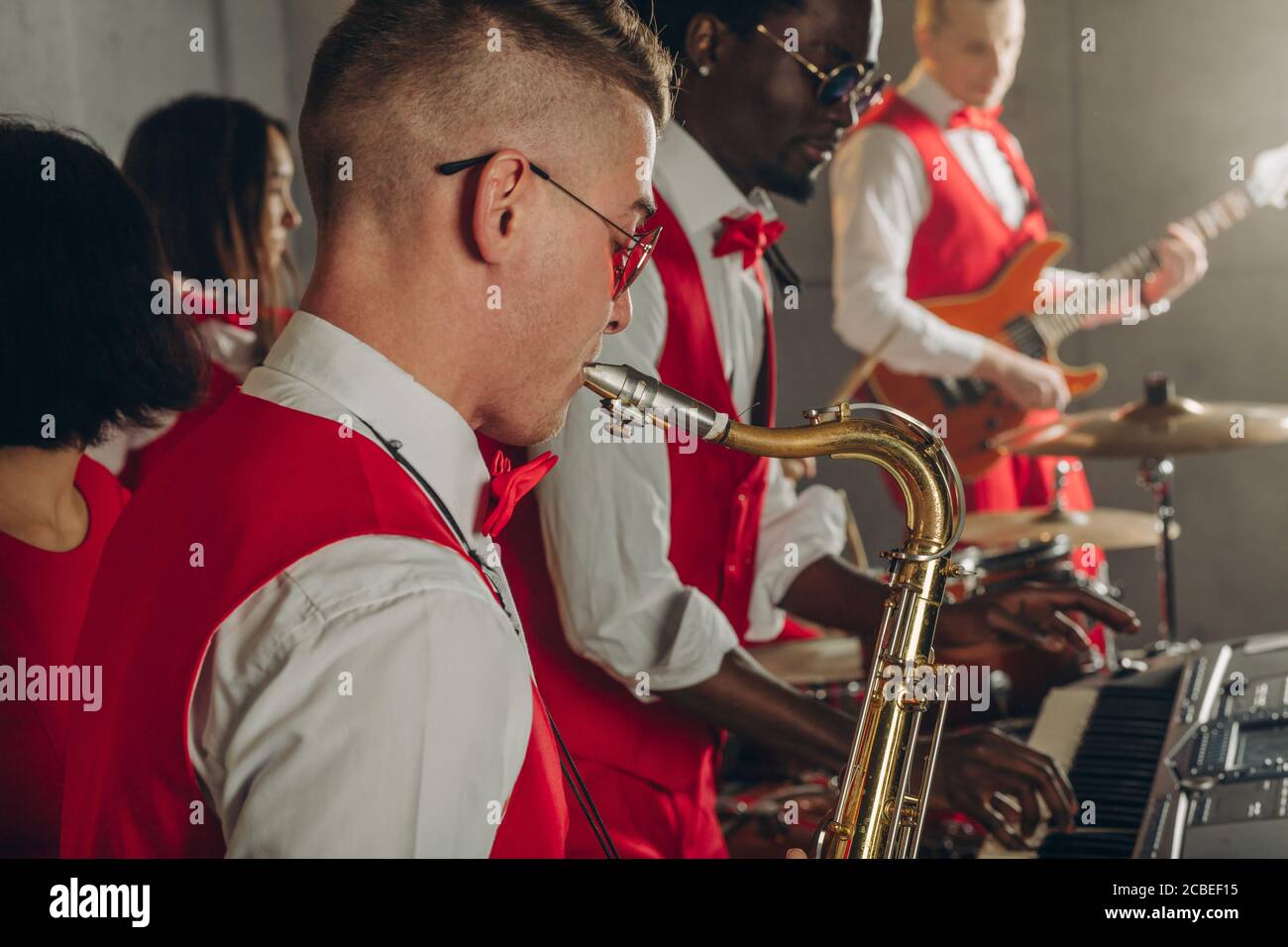 A local jazz band performing on the stage.multiracial jazz lovers ...