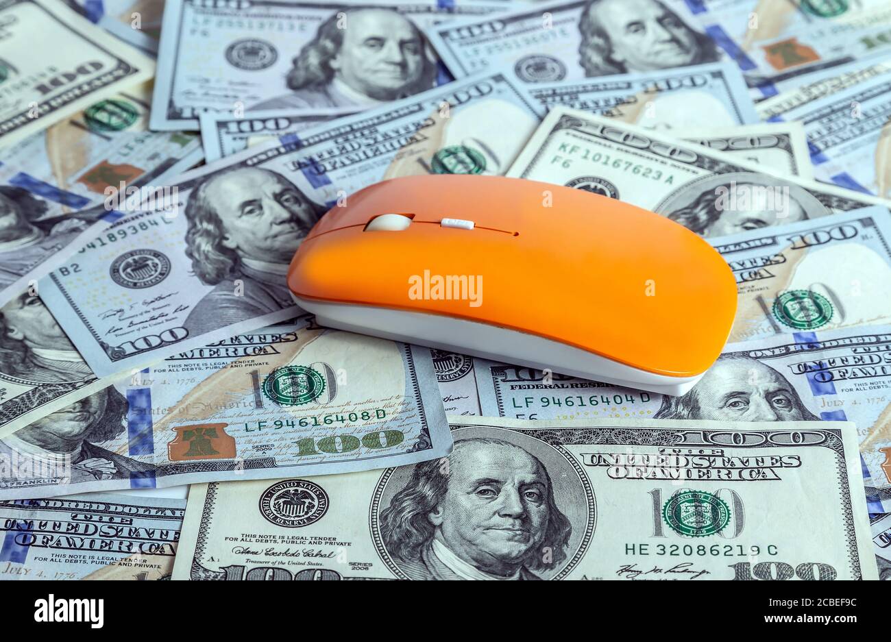 Computer Mouse click pc internet scroll surf in Dollar banknotes ...