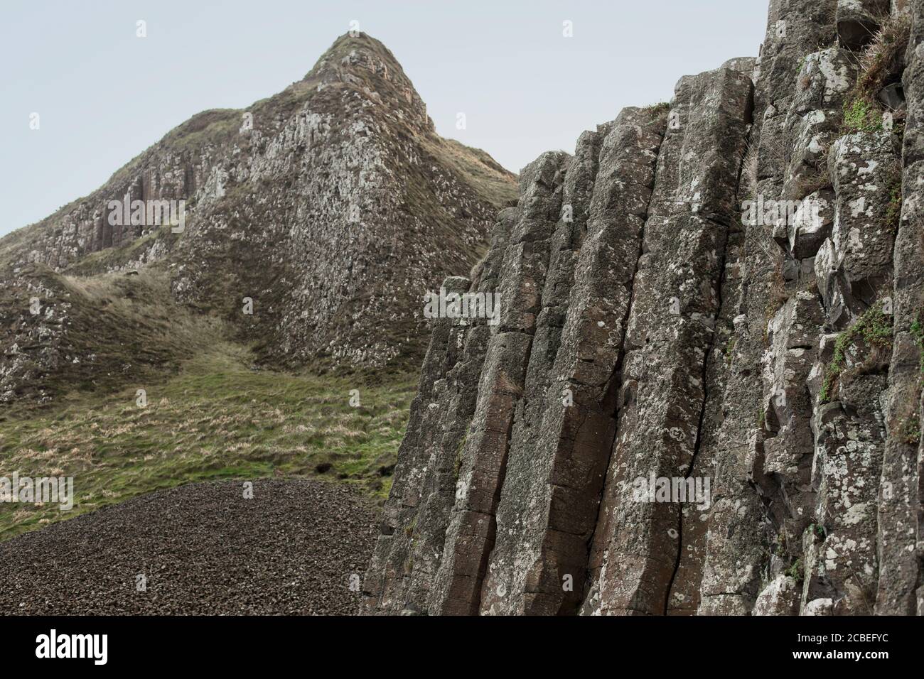 Closeup shot of basalt columns of Giant's Causeway on Ireland with a ...