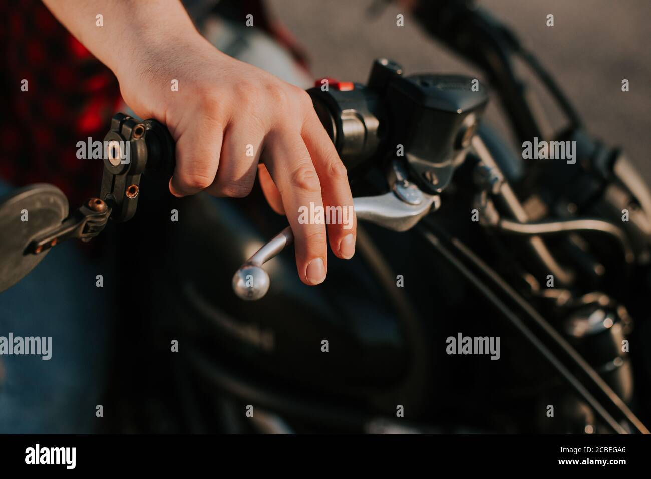 Selective focus shot of a male hand detail using brackets on a black ...