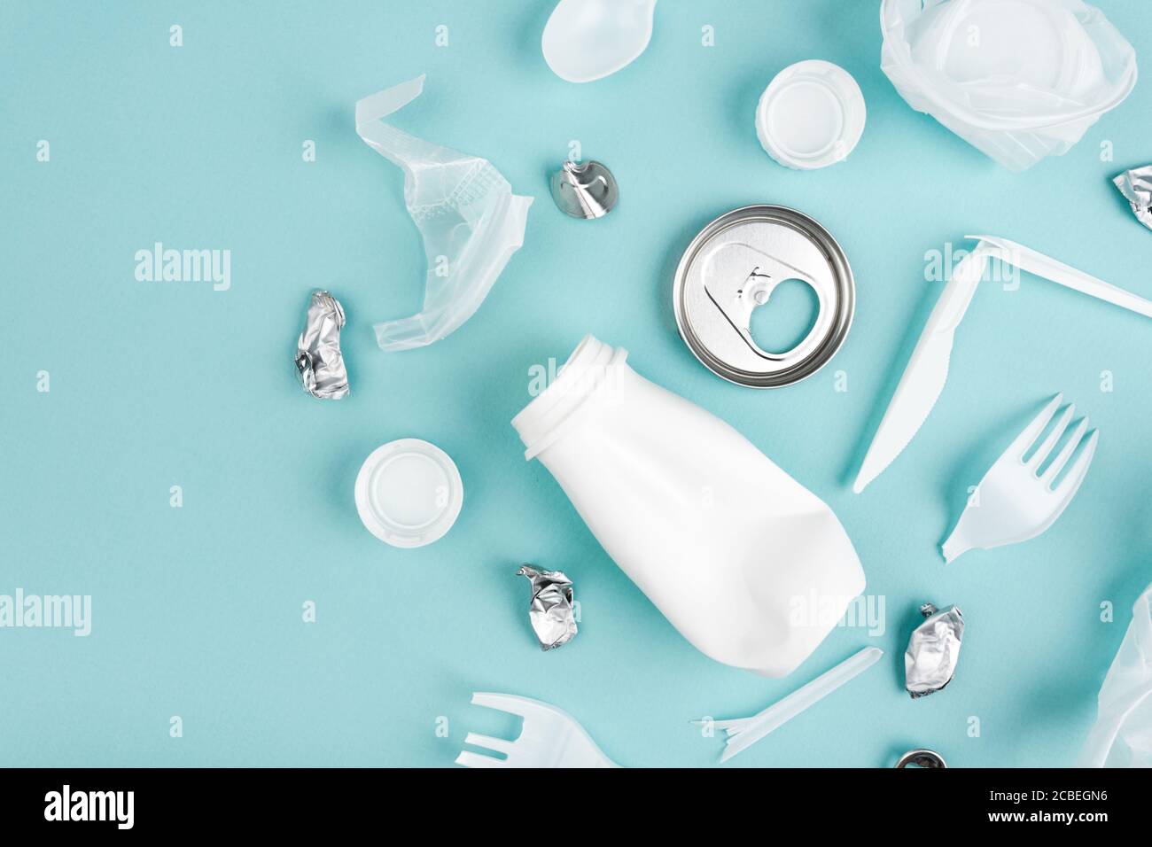 Plastic waste collection on blue background. Concept of Recycling ...