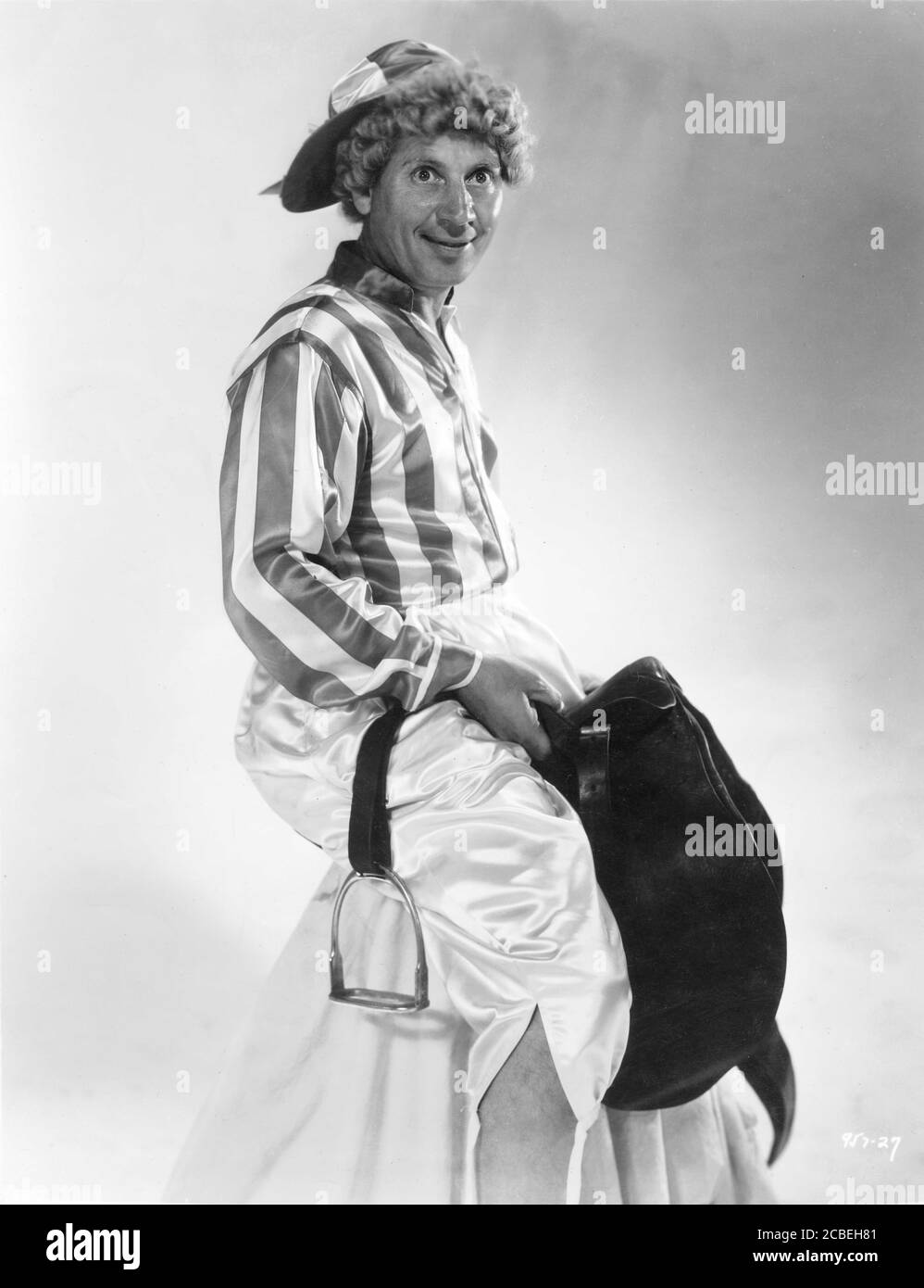 HARPO MARX Portrait in Jockey Outfit publicity for A DAY AT THE RACES ...