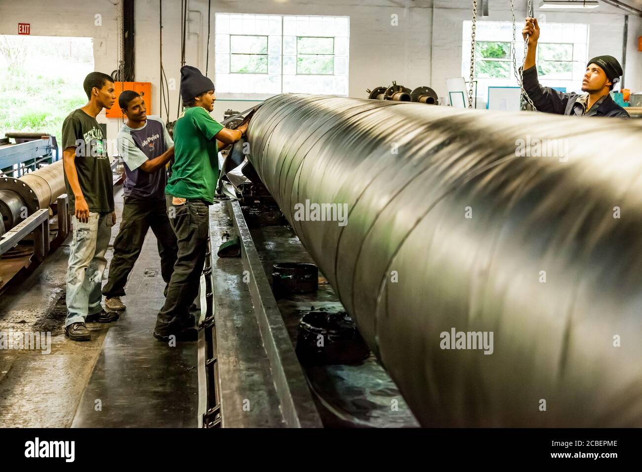 Johannesburg, South Africa - October 19, 2012: Diverse workers inside a ...