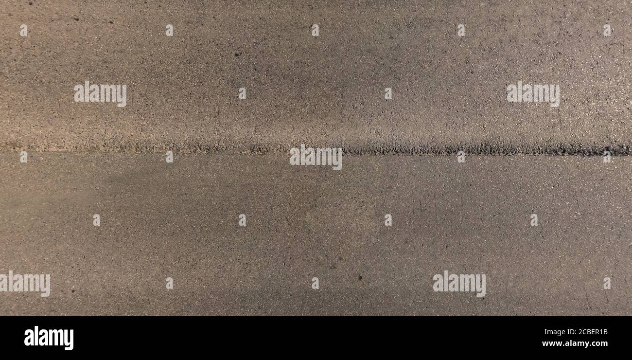 view from above on texture of old asphalt road Stock Photo - Alamy