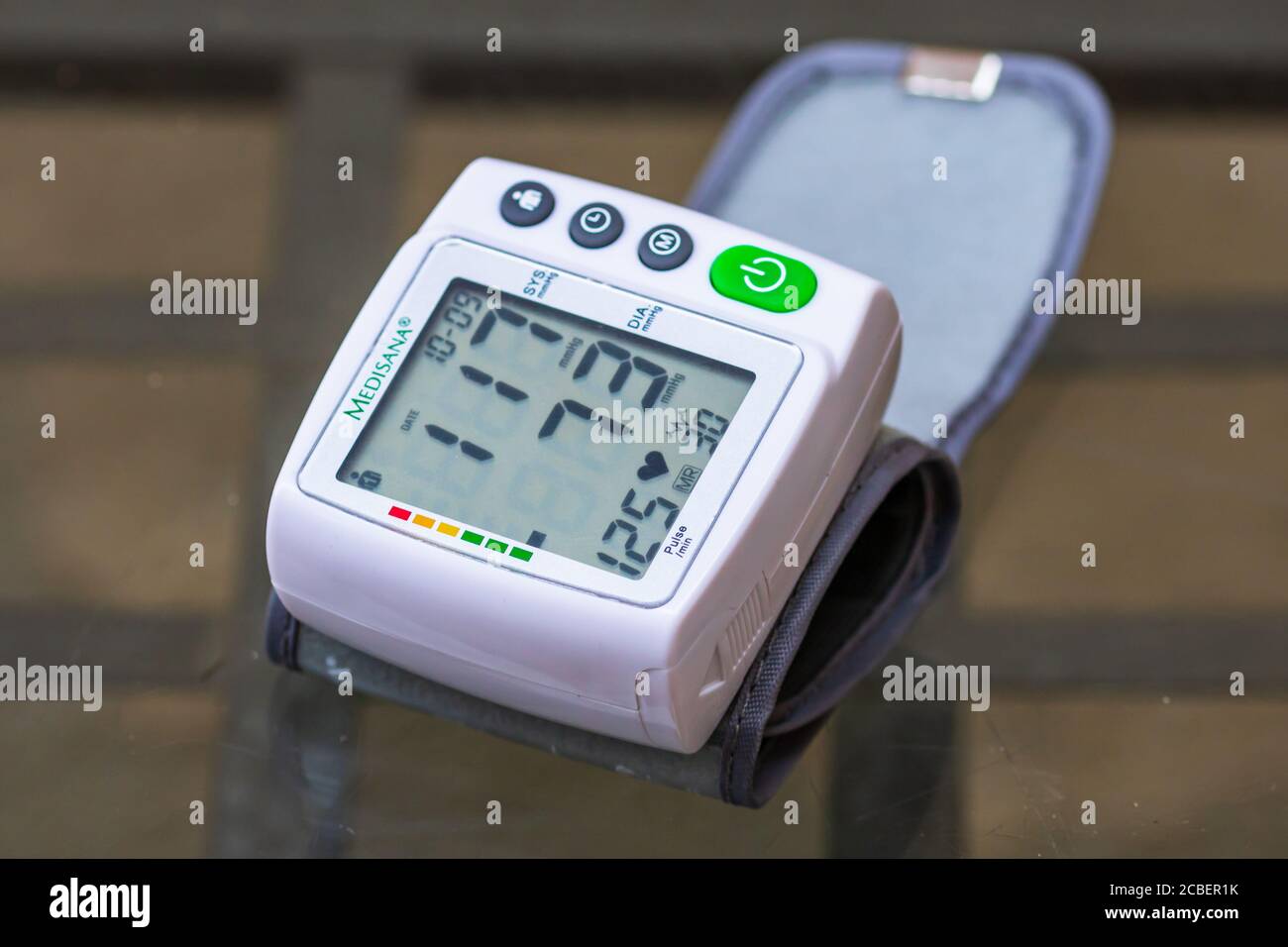Close up, detail of blood pressure cuff monitor isolated. Digital blood ...