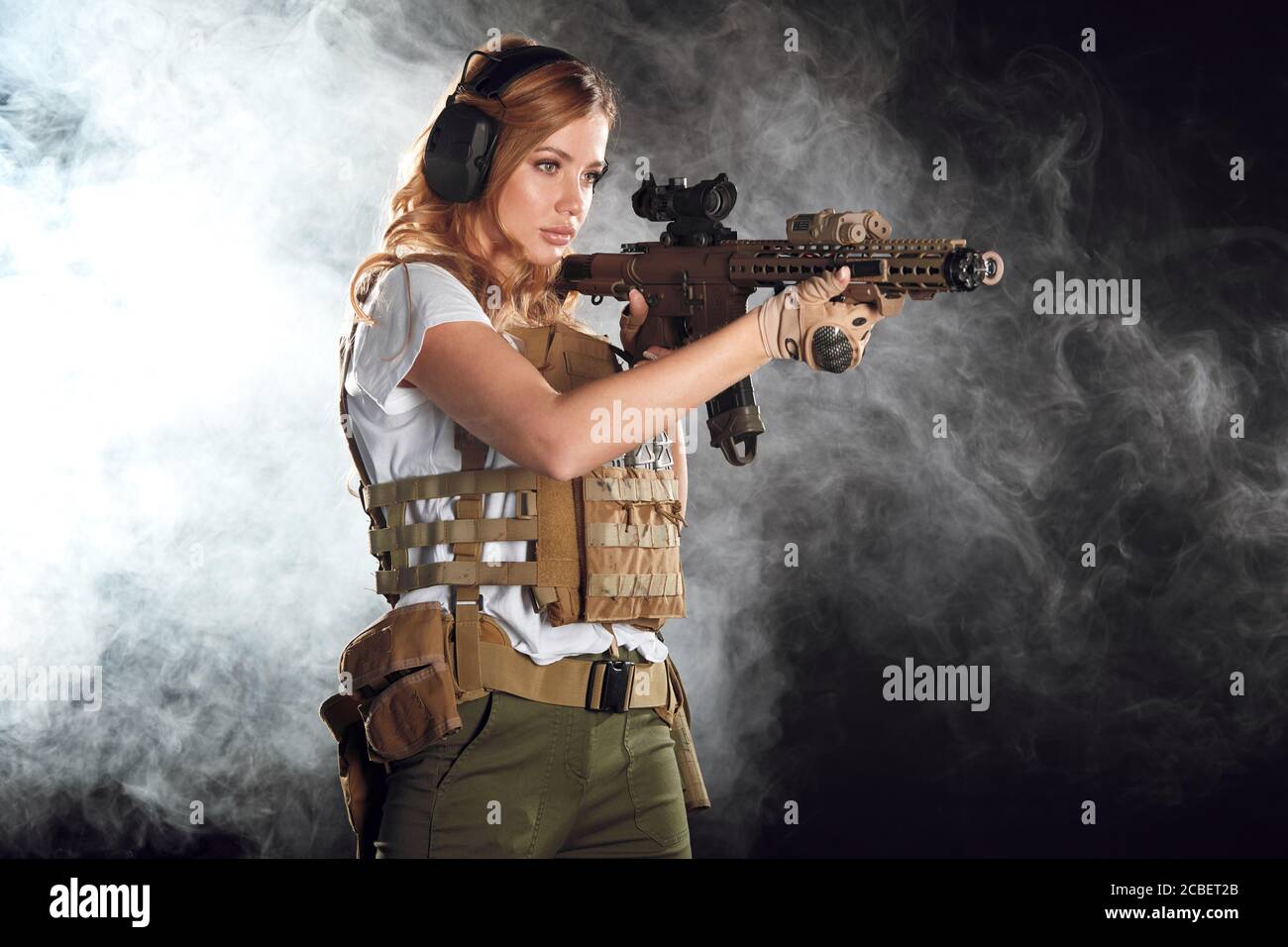 woman sniper with SVD sniper rifle. Female in US Army soldier with ...