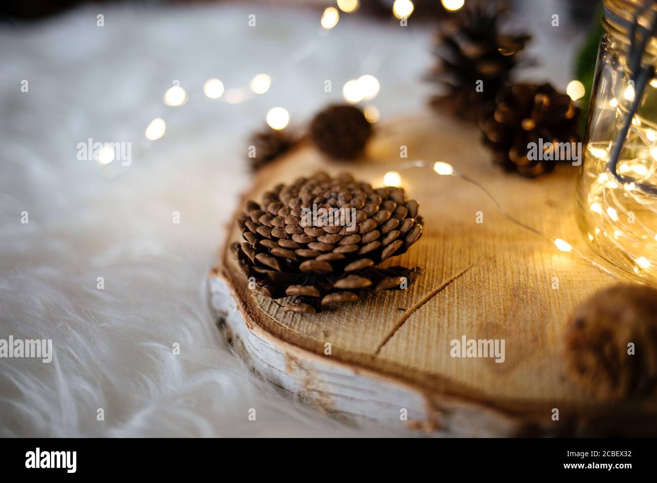 Closeup shot of Christmas tree bumps and lights a table Stock Photo - Alamy