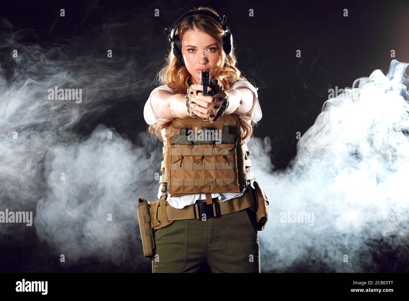 Firing handgun smoke hi-res stock photography and images - Alamy