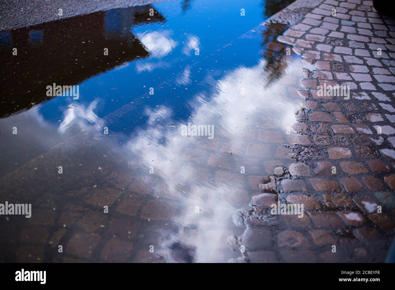 Sky reflection puddle hi-res stock photography and images - Alamy