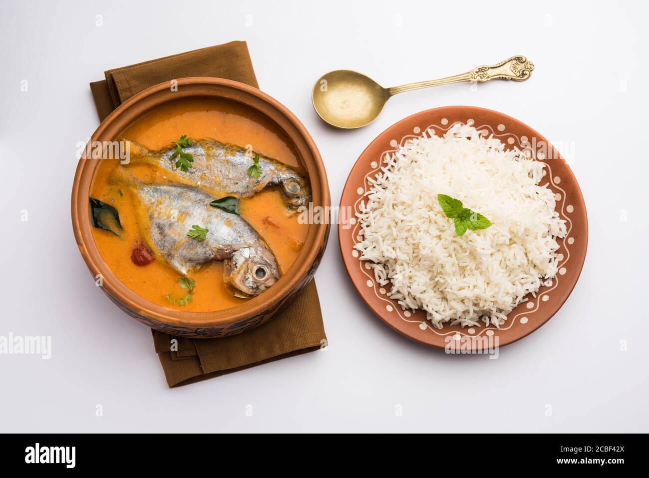 Spicy Fish Curry - kerala, konkan, bengal, goa style in Red and brown ...