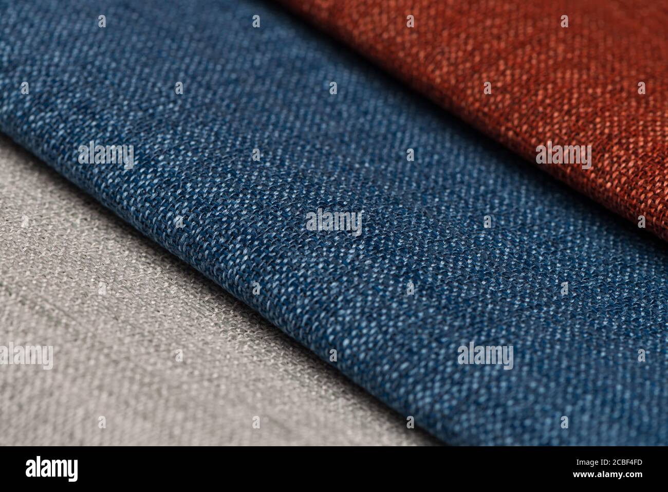 Closeup detail of multi color fabric texture samples Stock Photo - Alamy