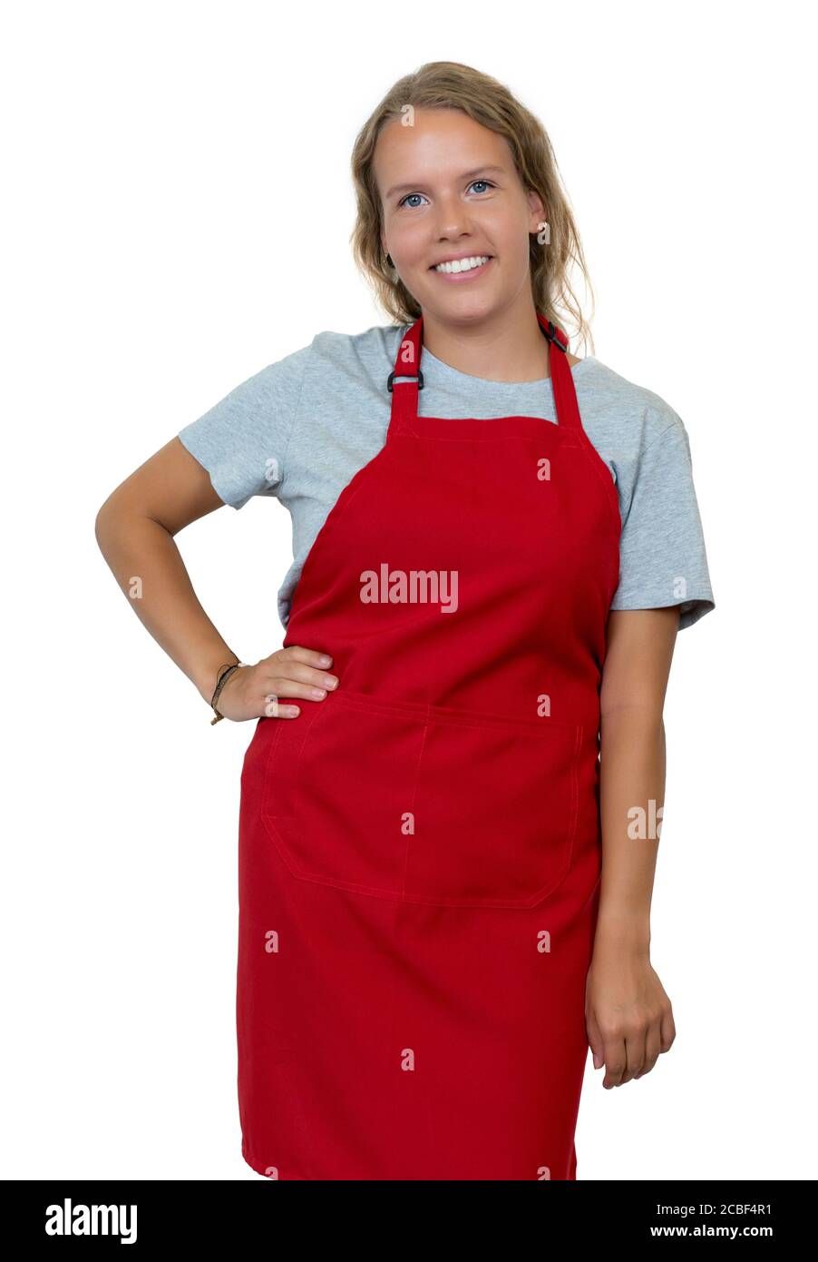 Beautiful blond german waitress with red apron isolated on white ...