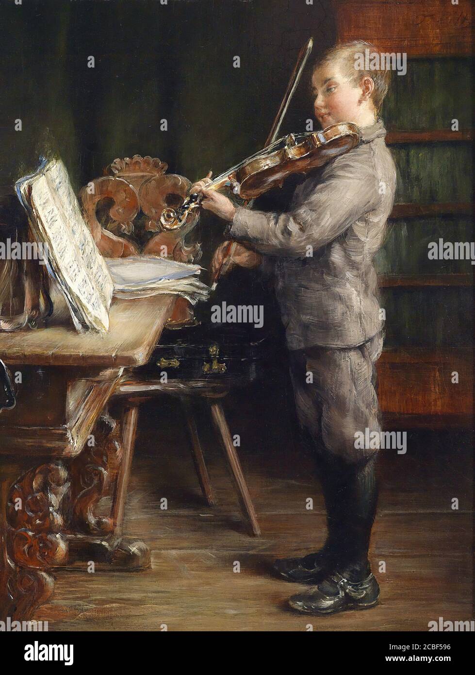 Boy playing the violin hi-res stock photography and images - Alamy
