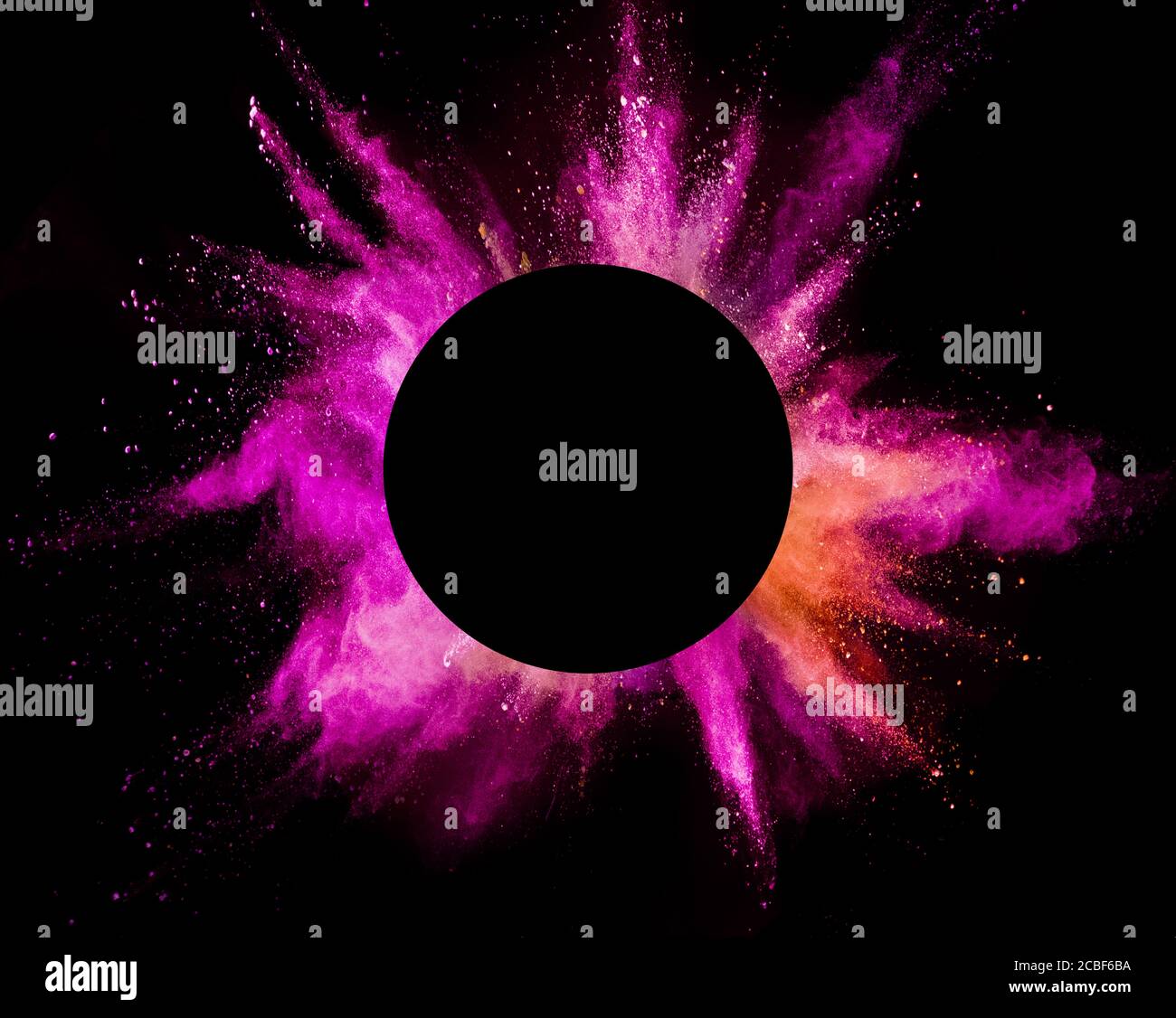Explosion of colored powder with empty circle, isolated on black ...