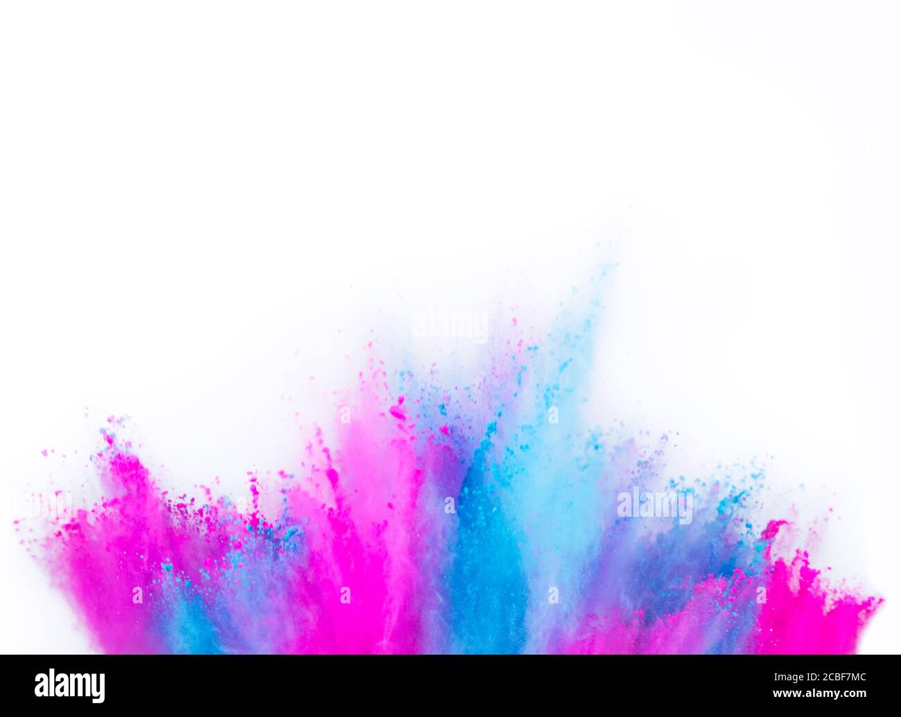 Multi colored powder explosion isolated on white background. Freeze ...