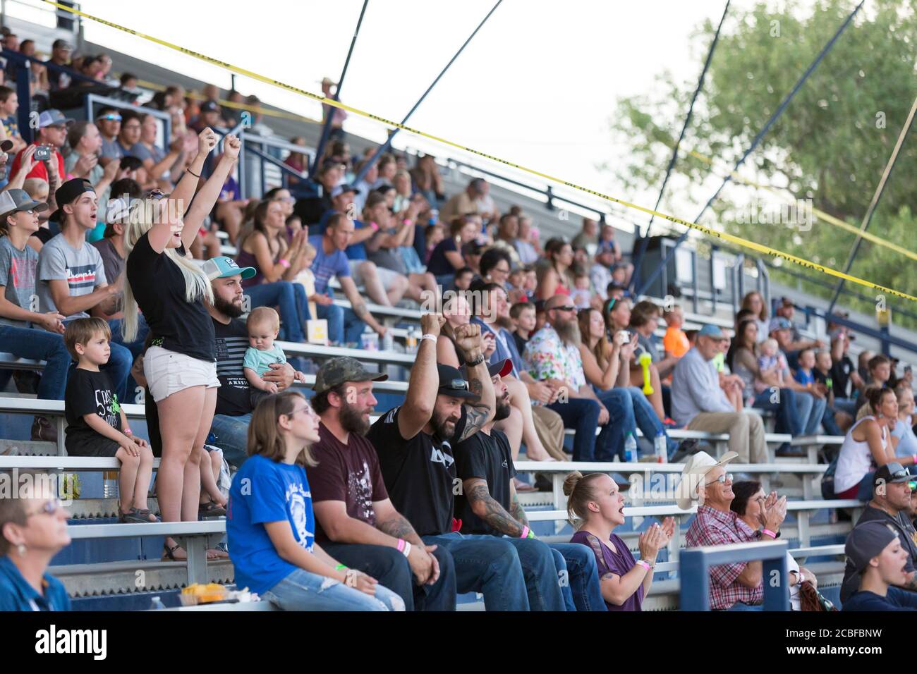 Visitors cheer during a motocross show at the Wyoming State Fair in ...