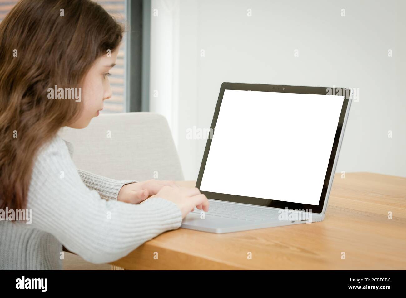 Child Uses a Computer for School Work Stock Photo - Alamy