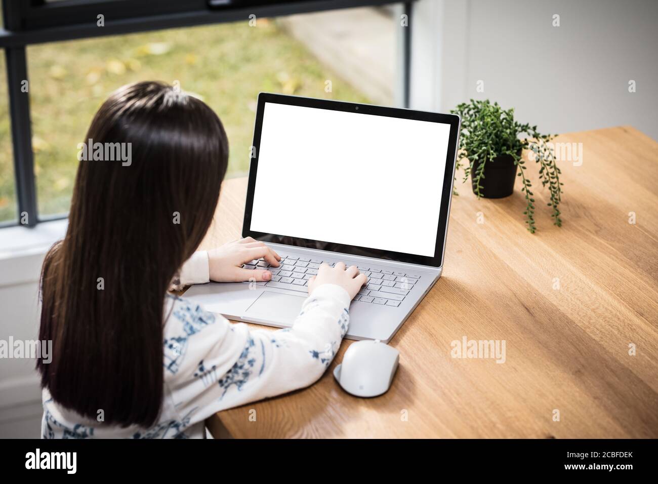 Child Uses a Computer for School Work Stock Photo - Alamy
