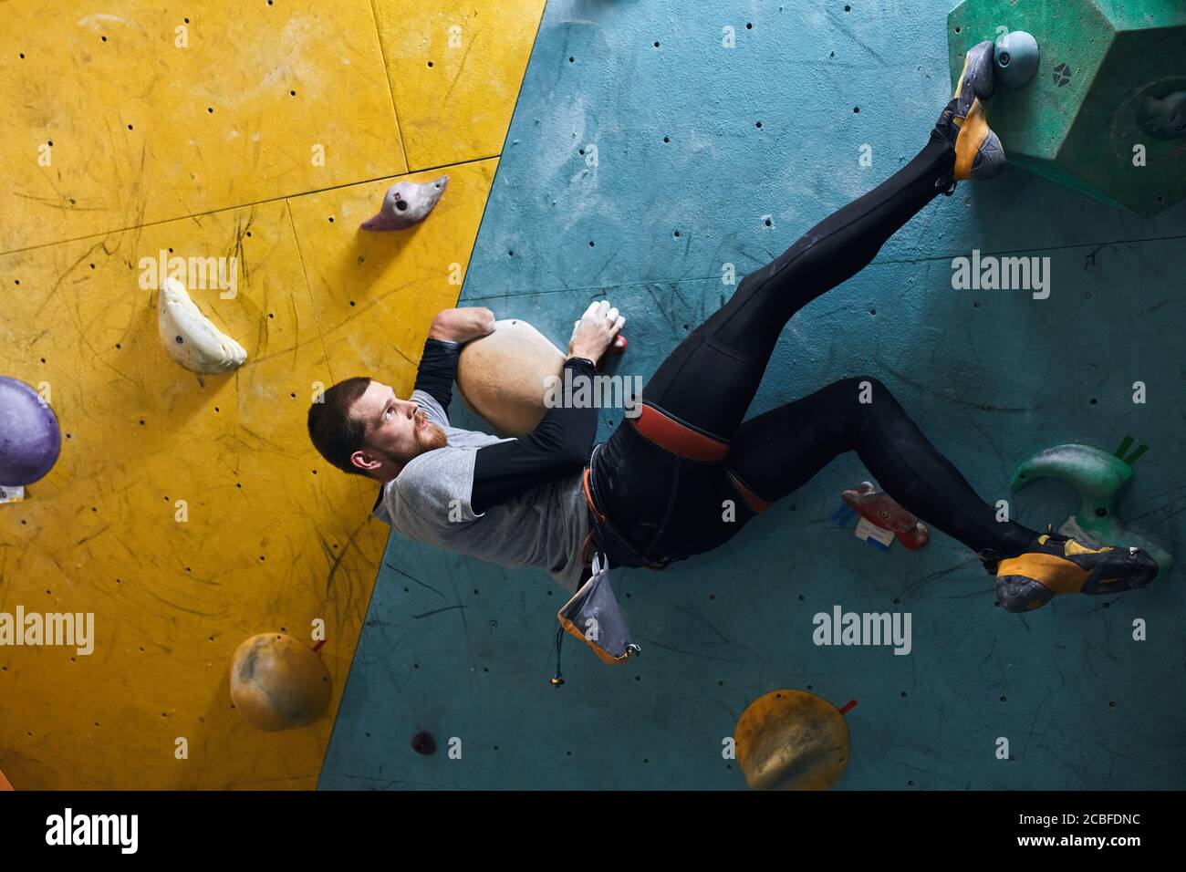 Strong flexible climber with physical disability trying not to fall ...