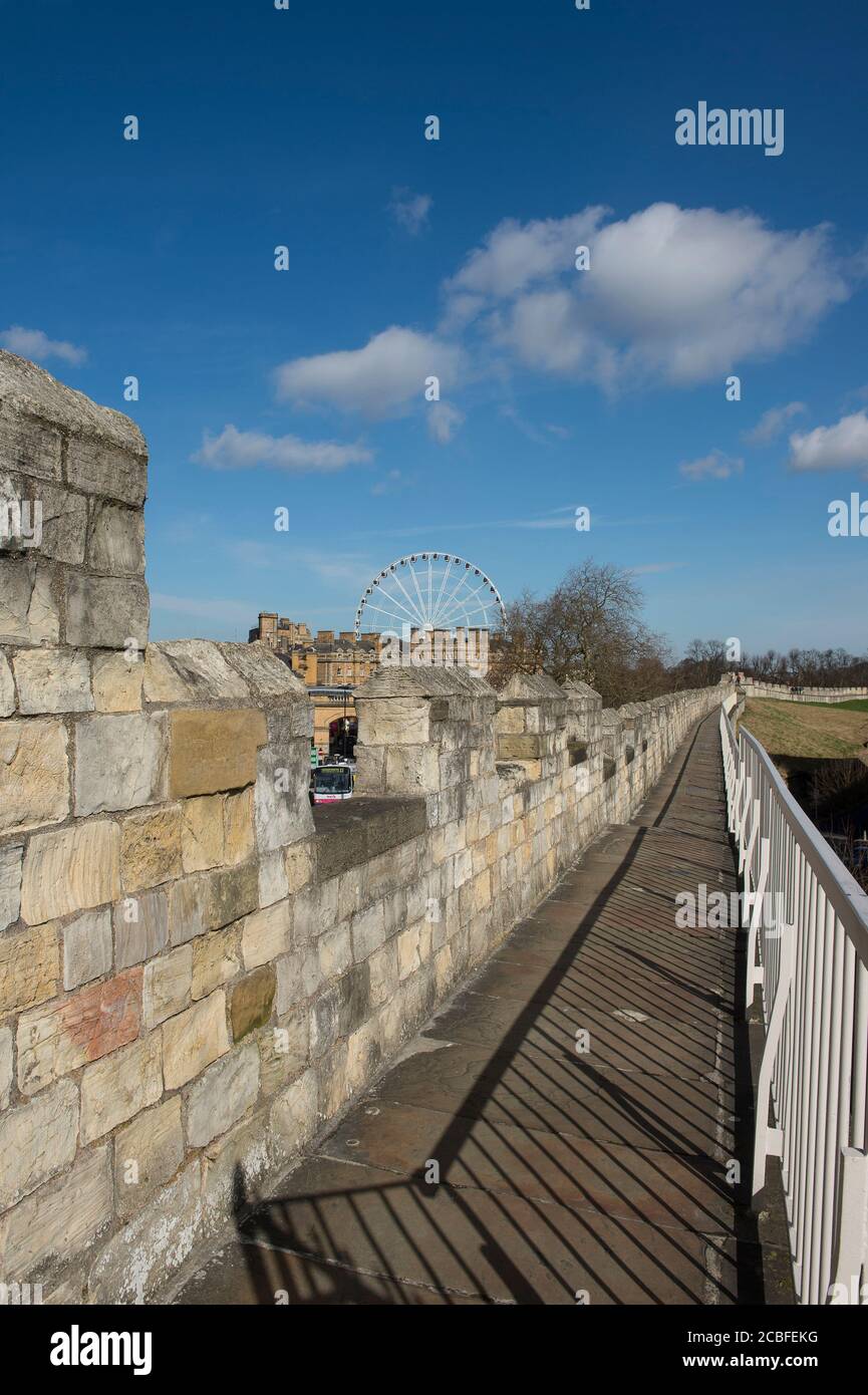 Empty stretch of the historic York City Walls with the Yorkshire Wheel ...