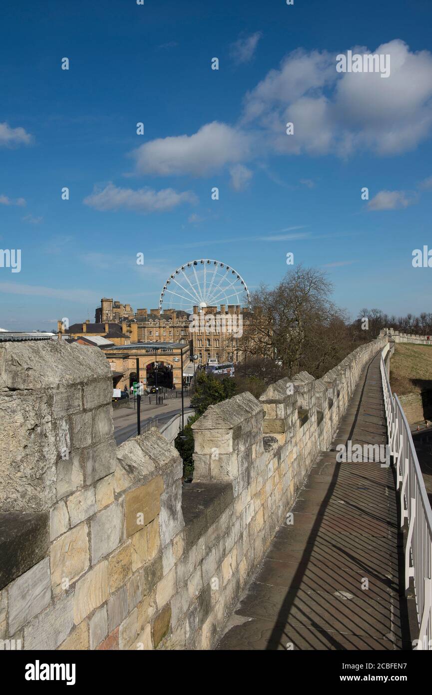 Empty stretch of the historic York City Walls with the Yorkshire Wheel ...
