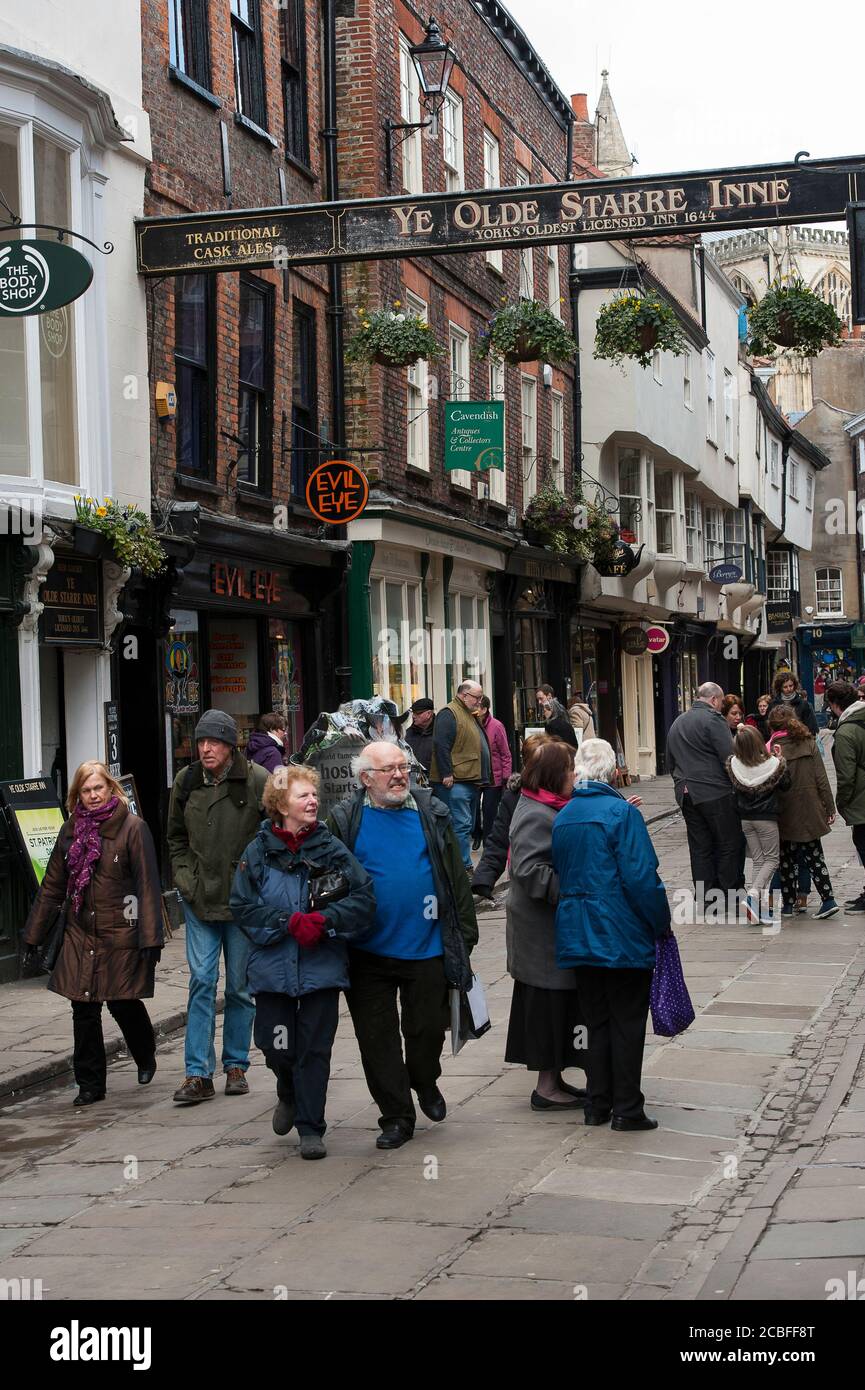 Tourists visiting shops in the centre of the City of York, Yorkshire ...