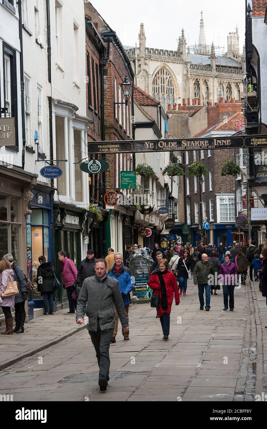 Tourists visiting shops in the centre of the City of York, Yorkshire ...