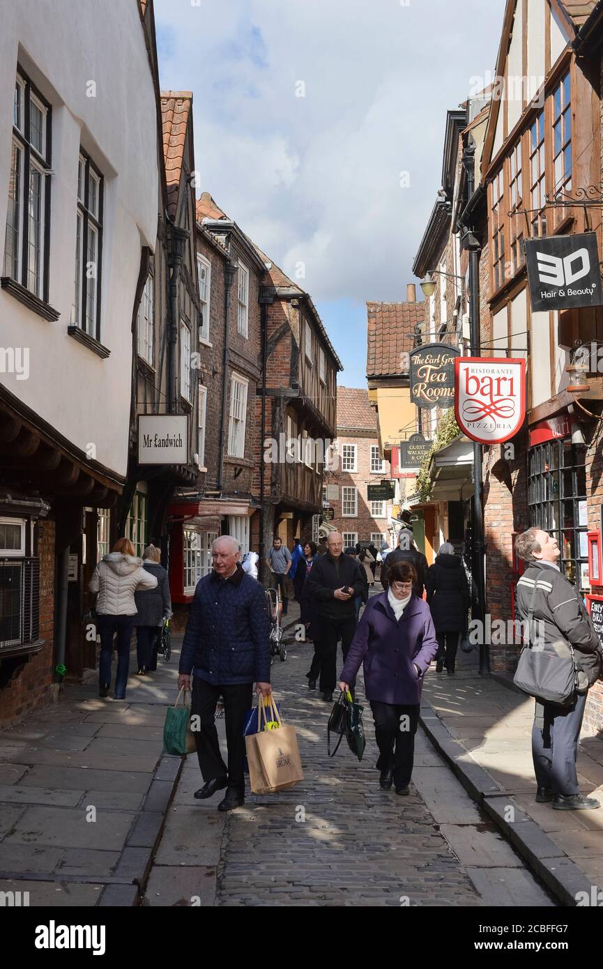 Tourists visiting shops in The Shambles, an old street in the City of ...