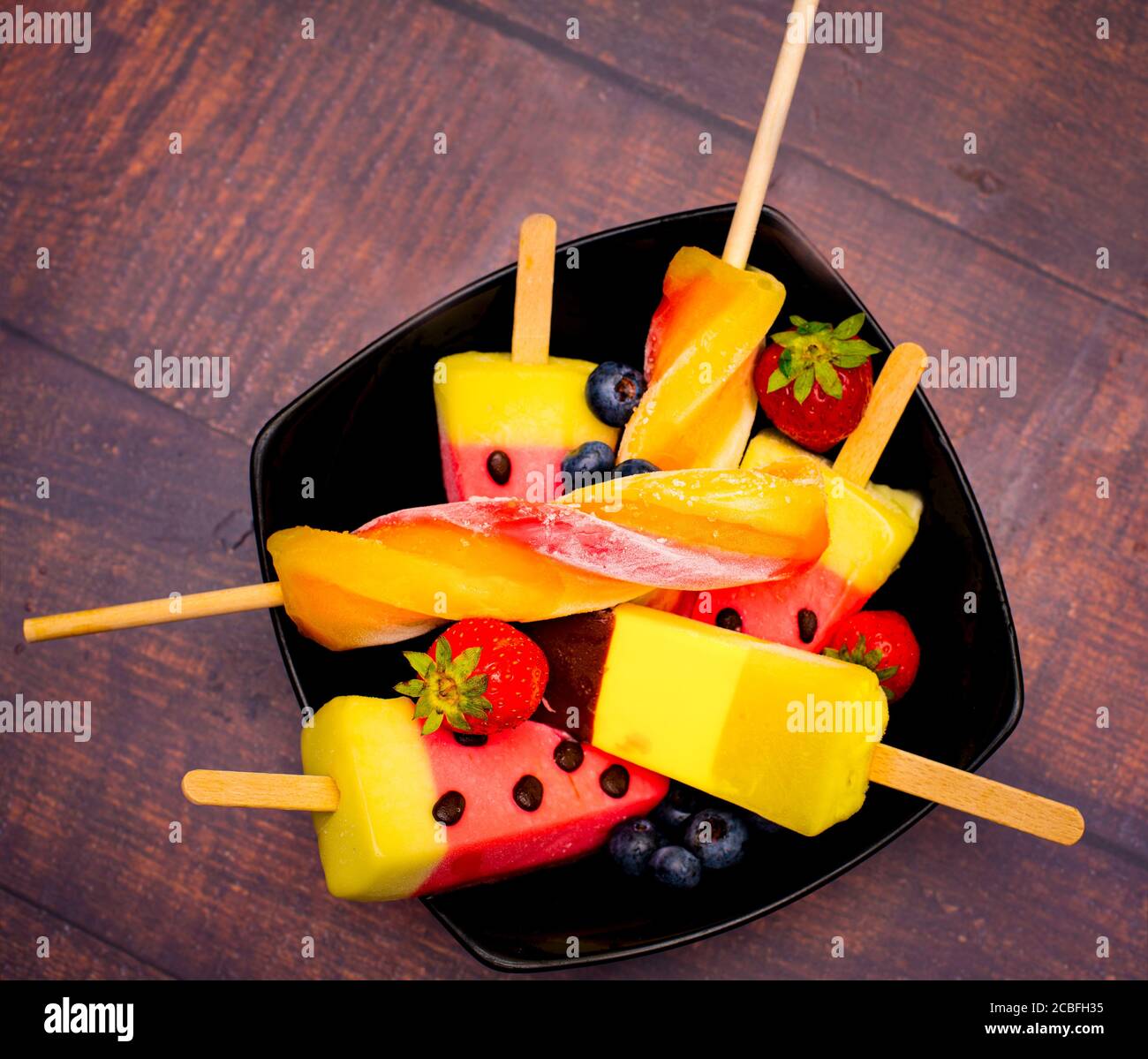 Fruity ice popsicles assortment Stock Photo - Alamy