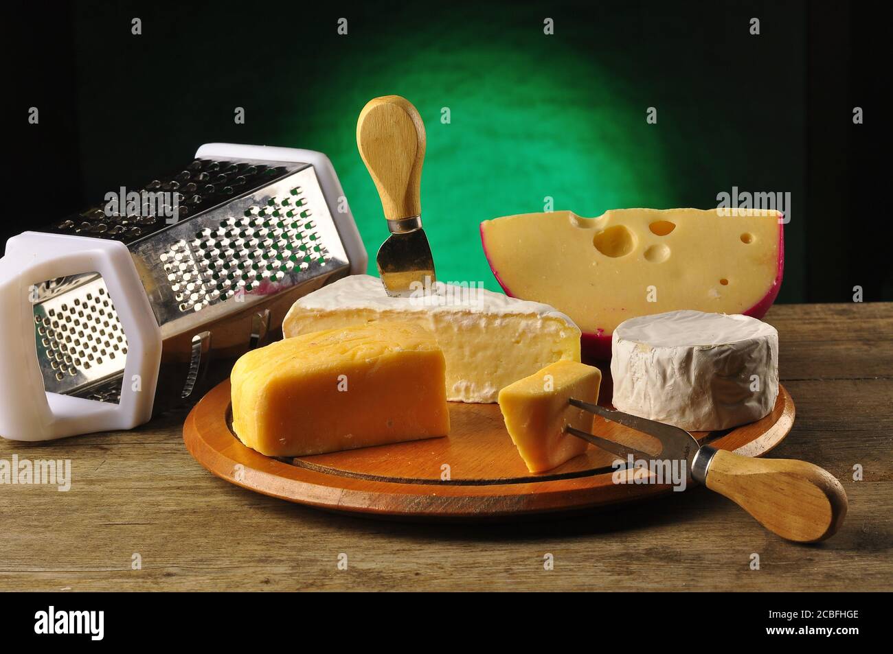 Table of mixed cheese on a studio shot Stock Photo - Alamy