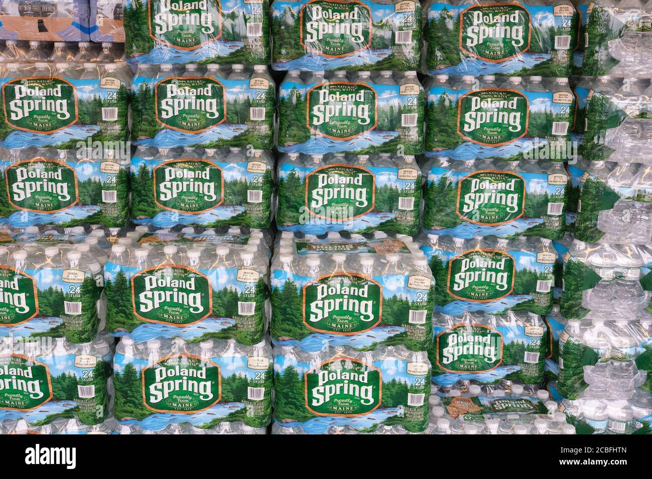 Cases of Poland Spring bottled water at a supermarket Stock Photo - Alamy