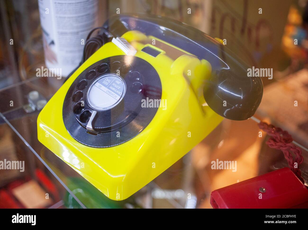 Yellow and black two tone GPO dial classic vintage telephone in glass ...