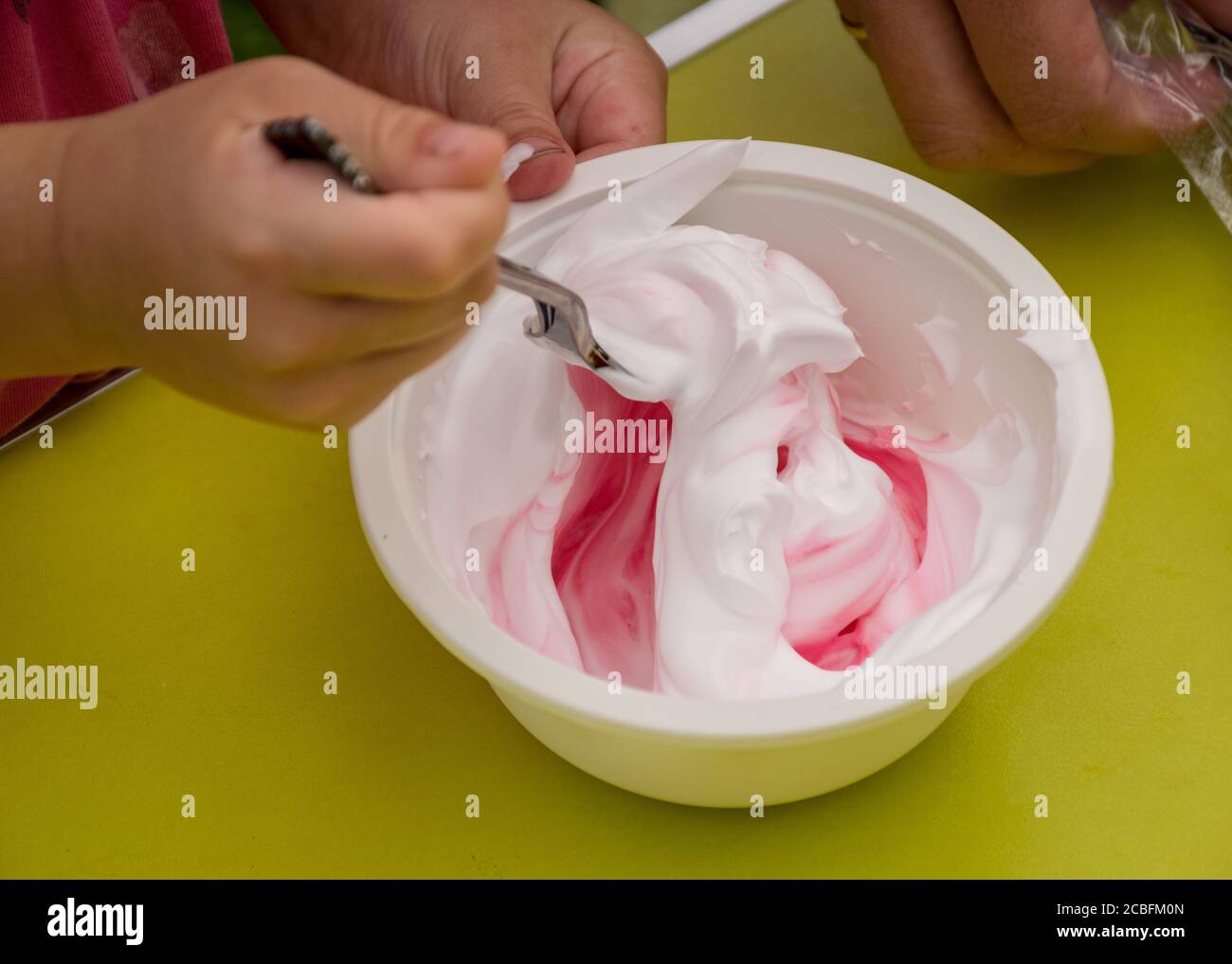 bowl with a colorful slime, making a slime at a birthday party ...
