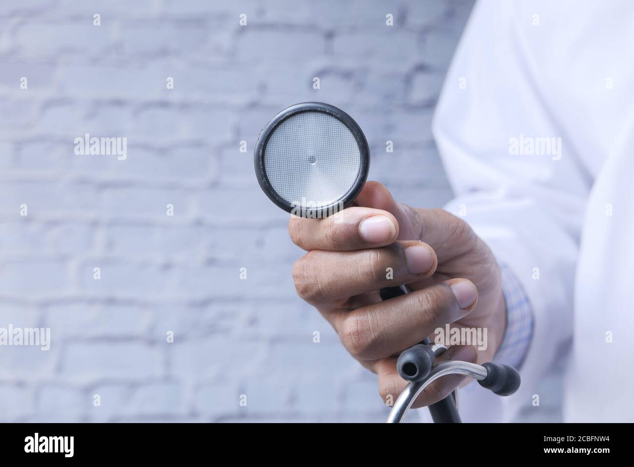 Young doctor using stethoscope check hi-res stock photography and ...